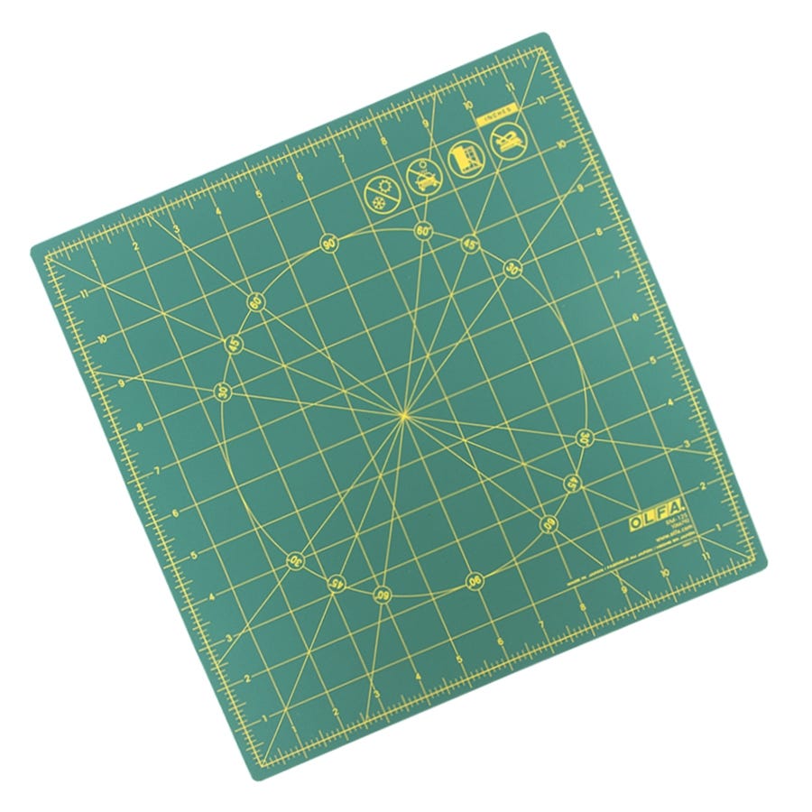 Olfa 12" x 12" Rotating Cutting Mat - quilting-designs.com